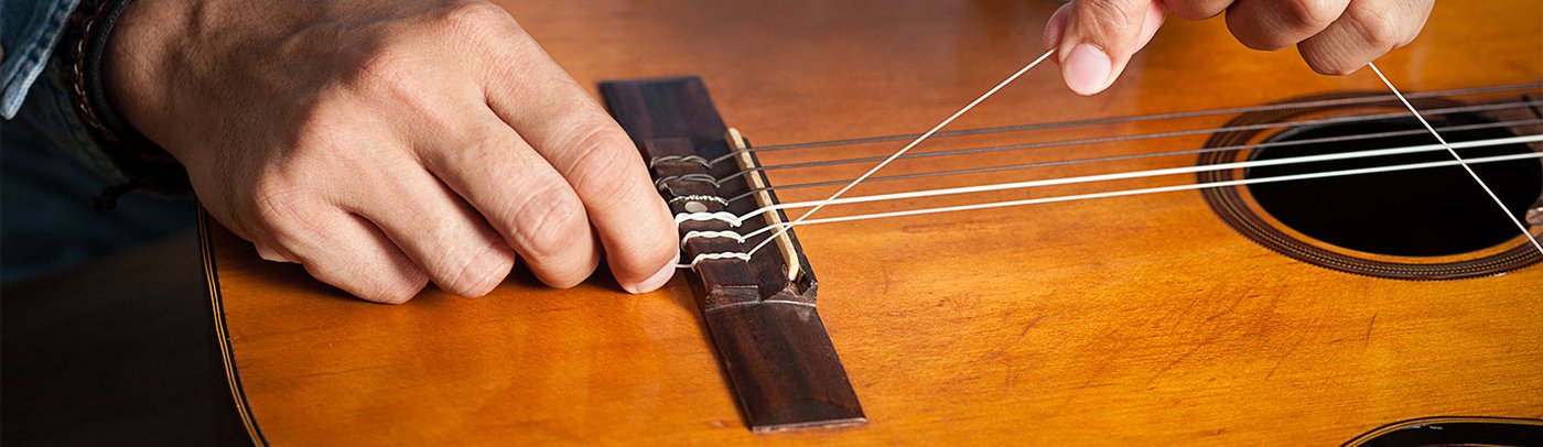 Comment changer une corde de guitare ? | Cultura